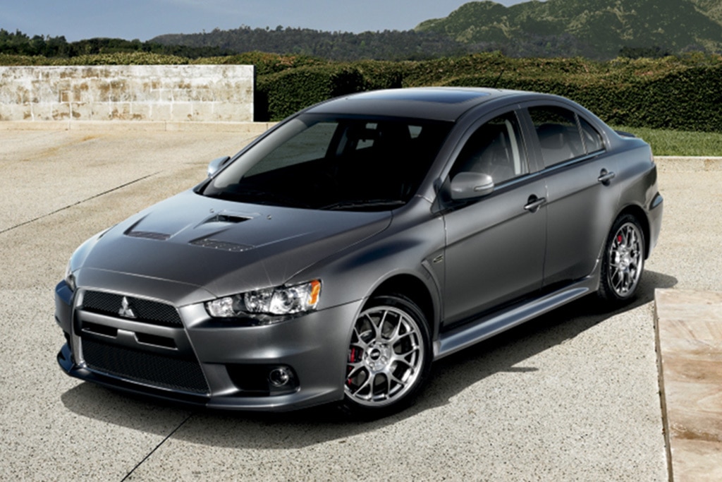 Subaru WRX STI vs. Mitsubishi Lancer Evolution: Which Is Better ...
